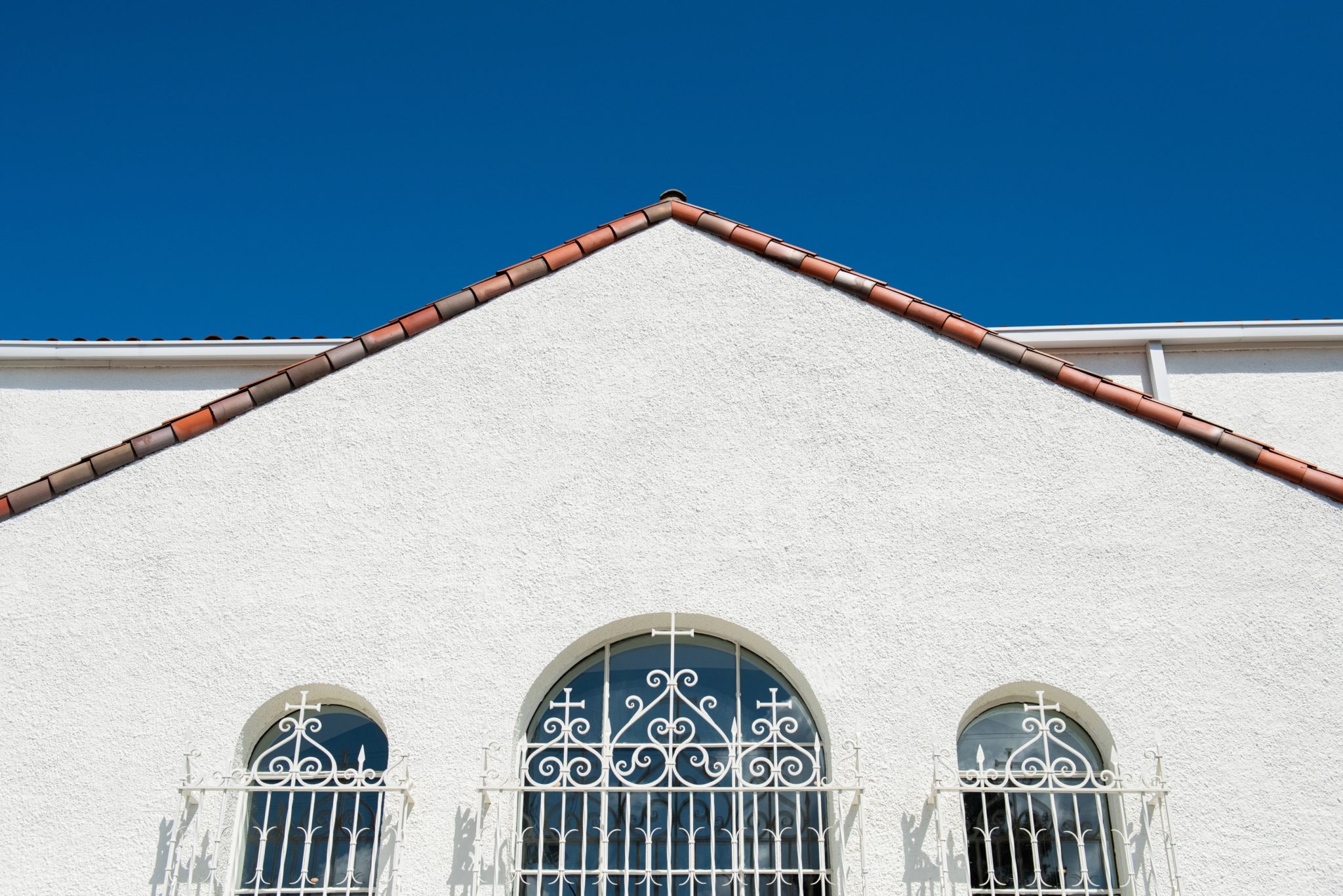 our-lady-lourdes-church-doors-pointed-roof - Holly & Smith Architects